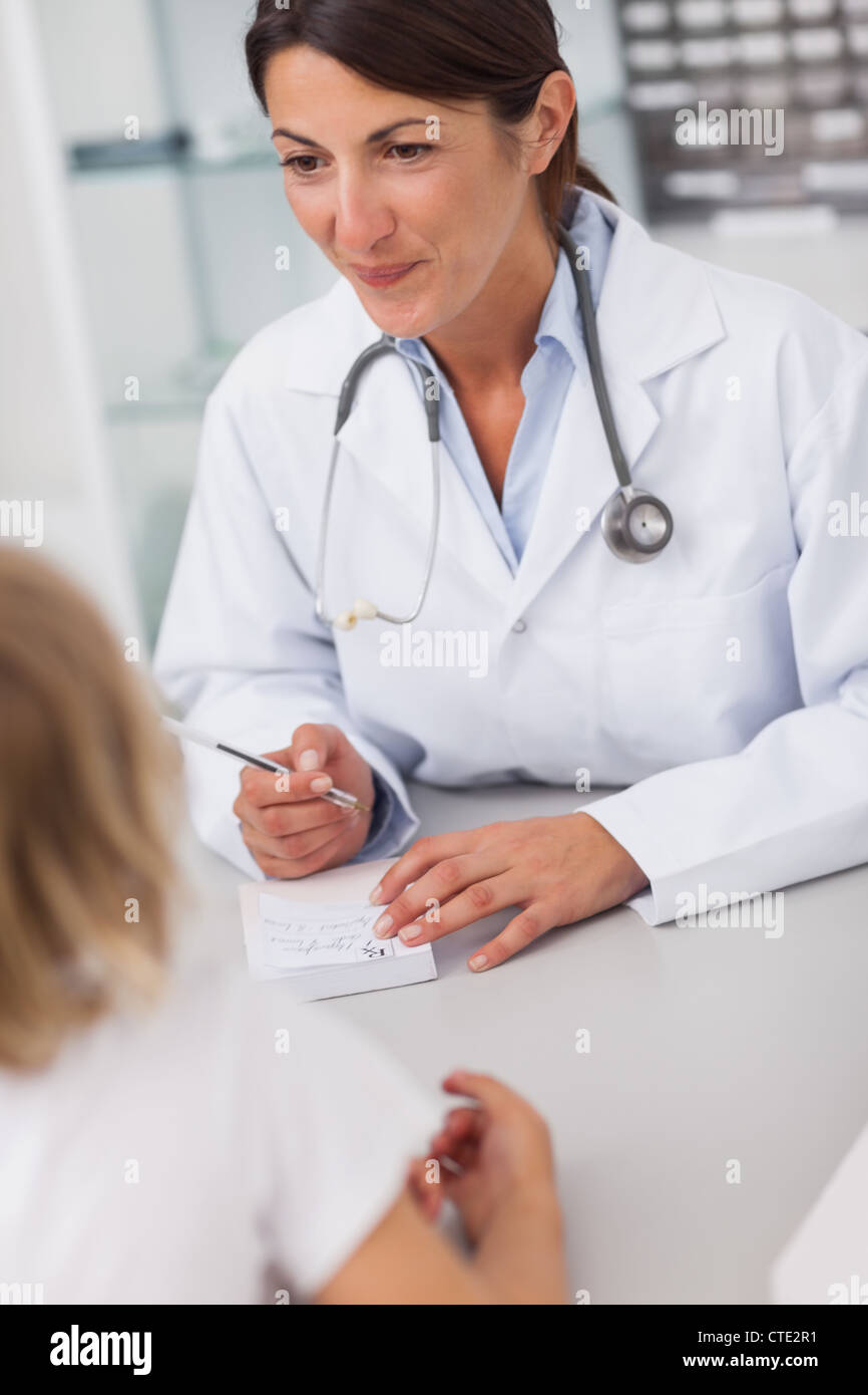Doctor sitting at her office Stock Photo - Alamy