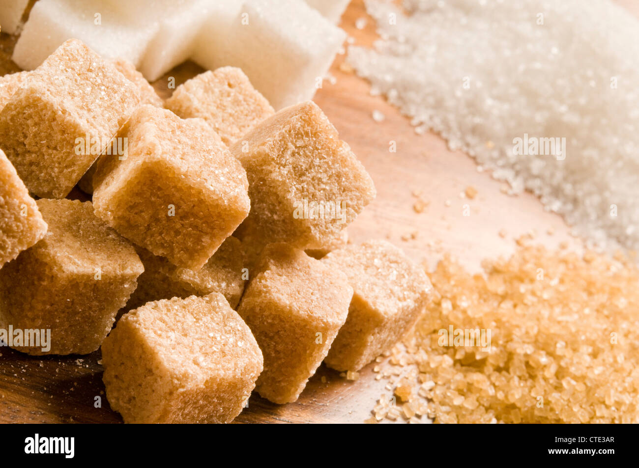 white and yellow sugar in powder and cubes Stock Photo - Alamy