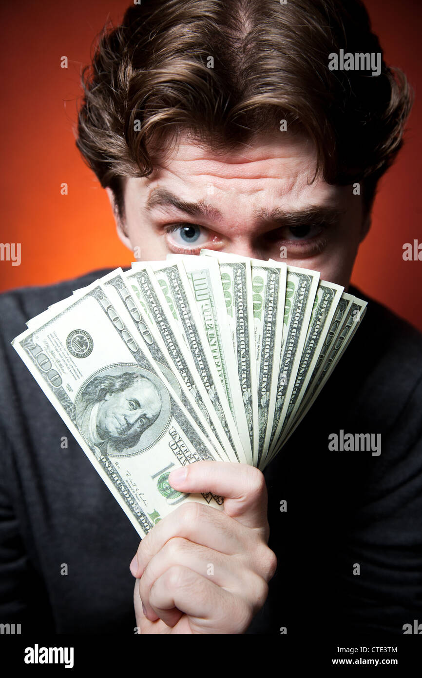 Man with money Stock Photo - Alamy