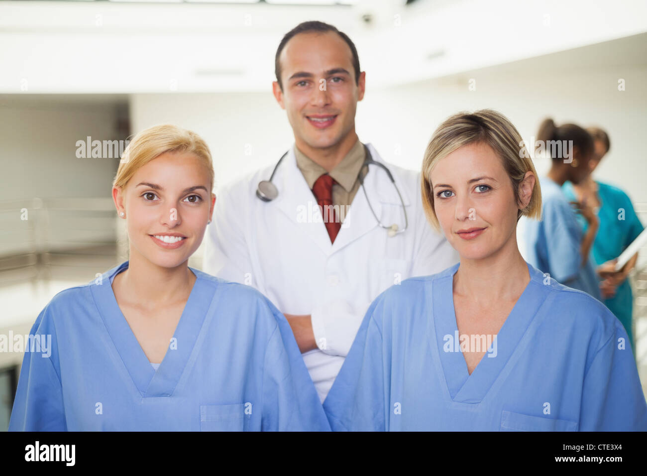 Two nurses and a doctor Stock Photo - Alamy