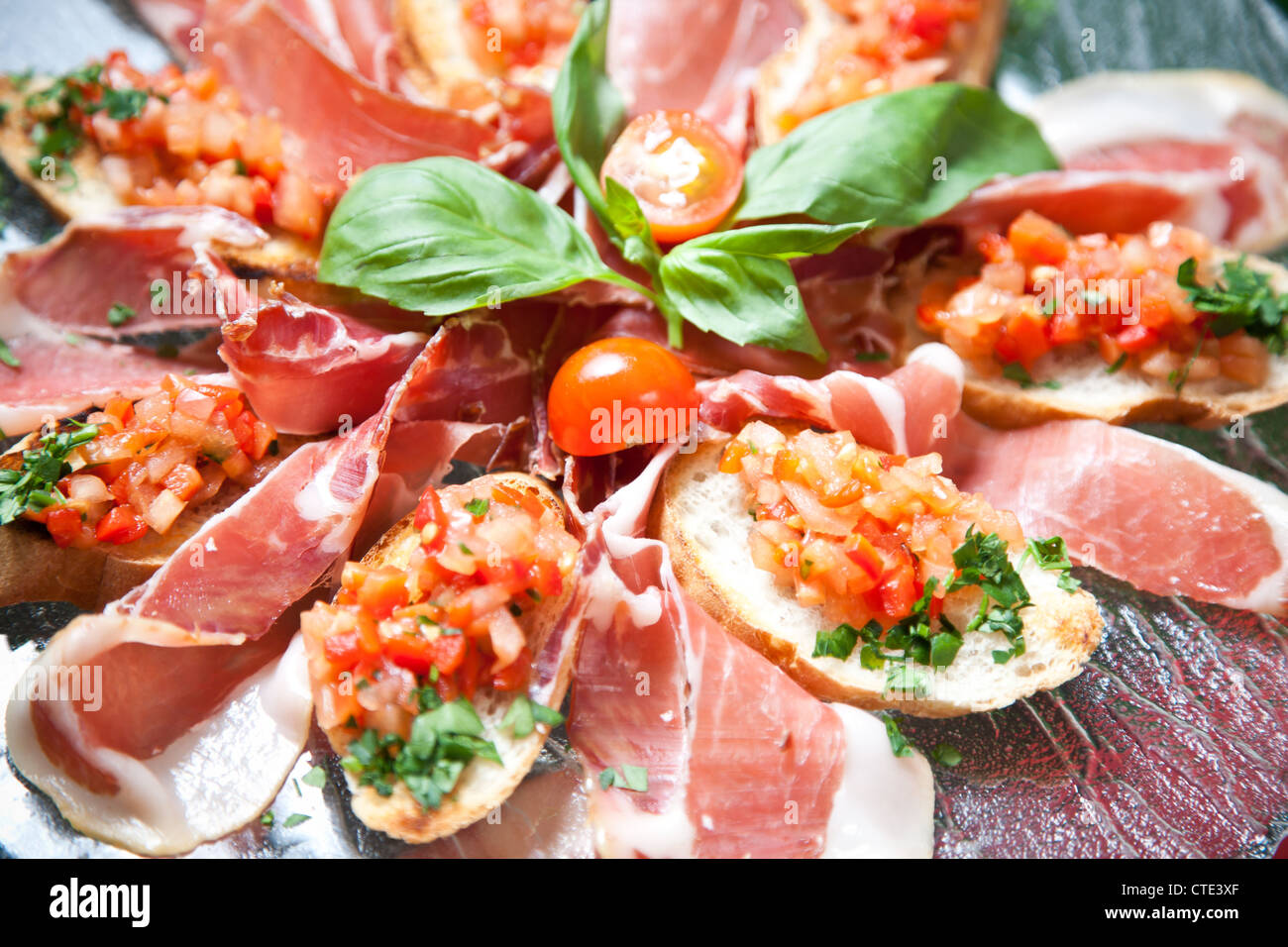 Bruschetta on a glass plate Stock Photo - Alamy