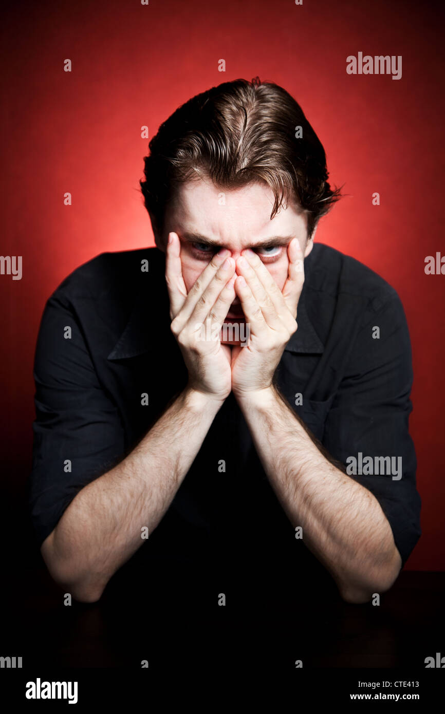 Portrait of young sad male Stock Photo - Alamy