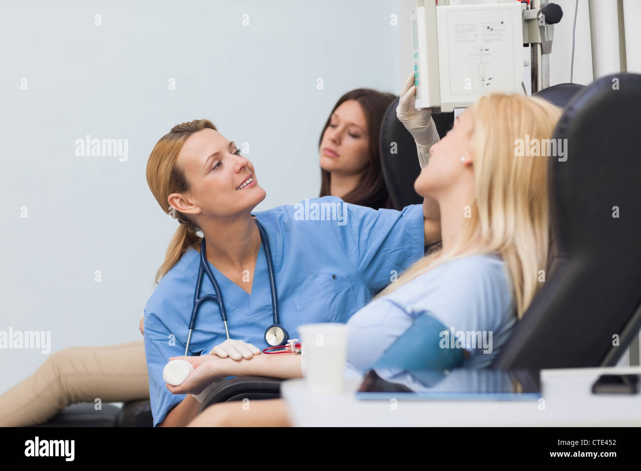 Nurse touching at the monitor Stock Photo - Alamy