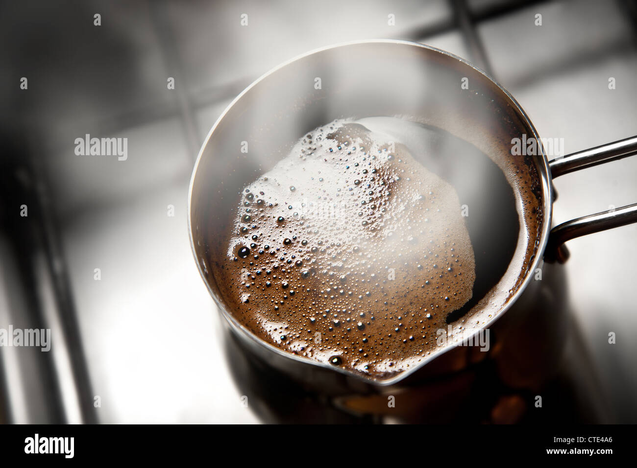 Cup of steaming coffee, small dof Stock Photo - Alamy