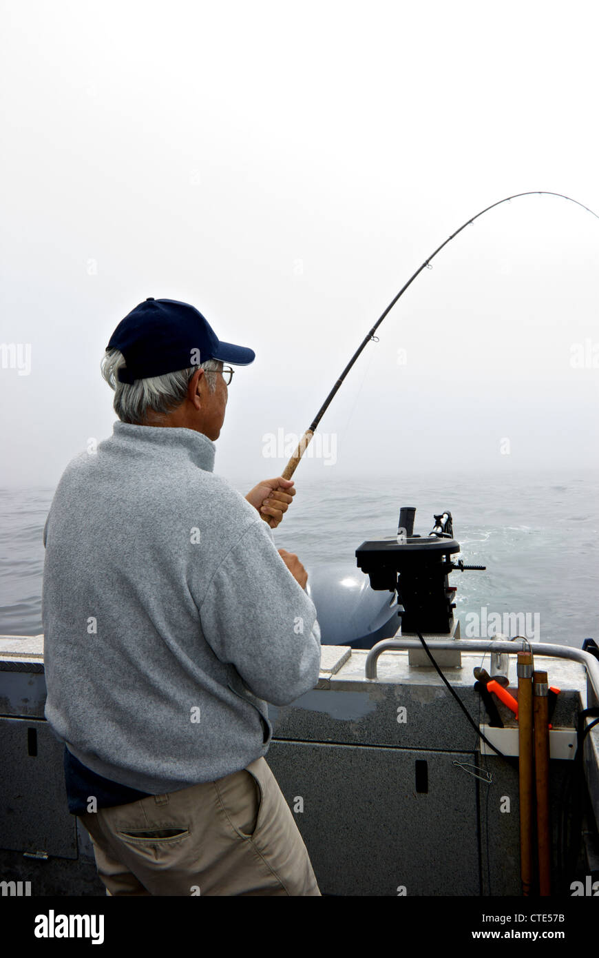Sport fishing angler playing salmon Swiftsure Bank Port Renfrew BC ...