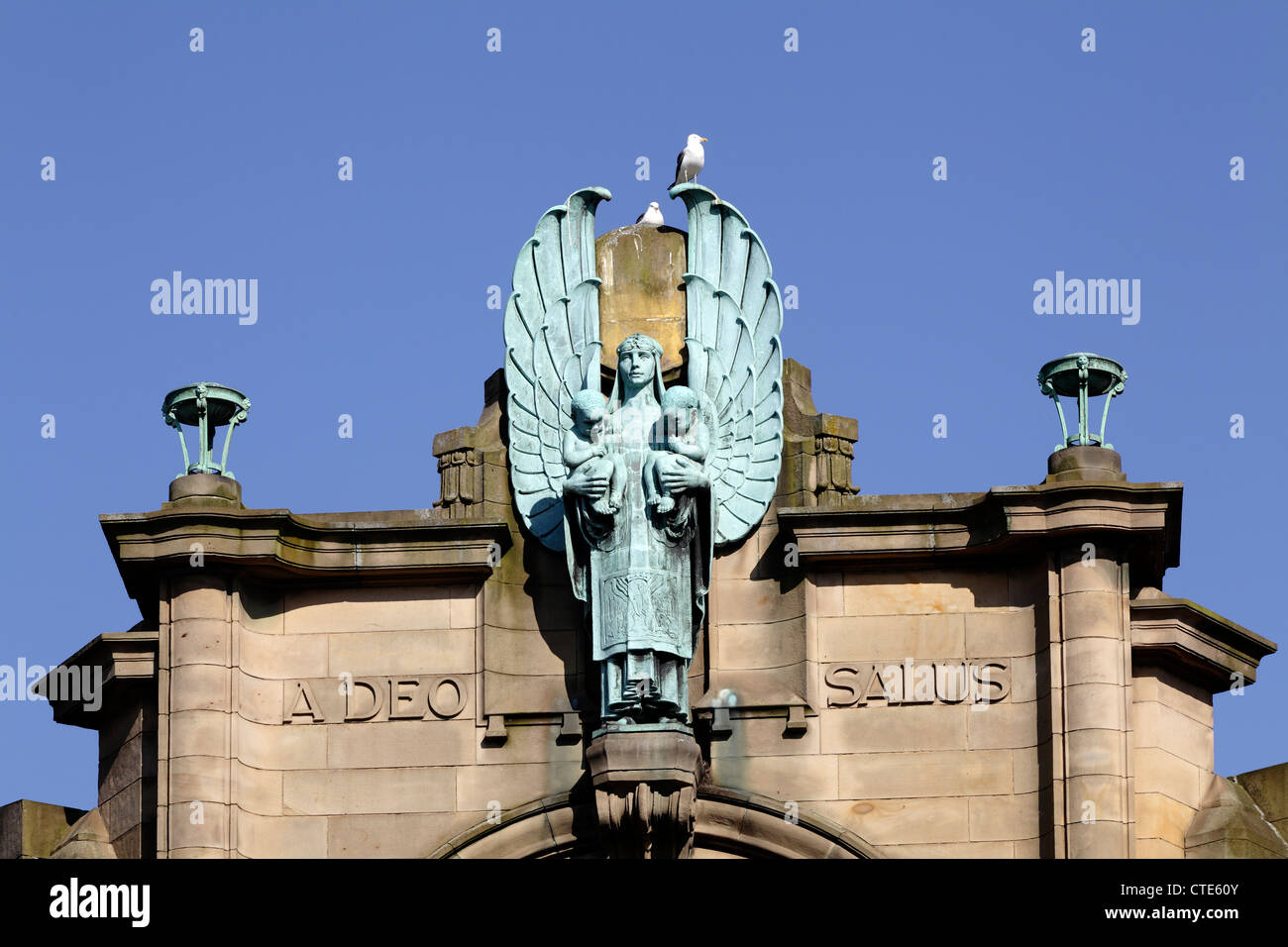 Russell Institute, Paisley, bronze guardian angel sculpture holding two ...