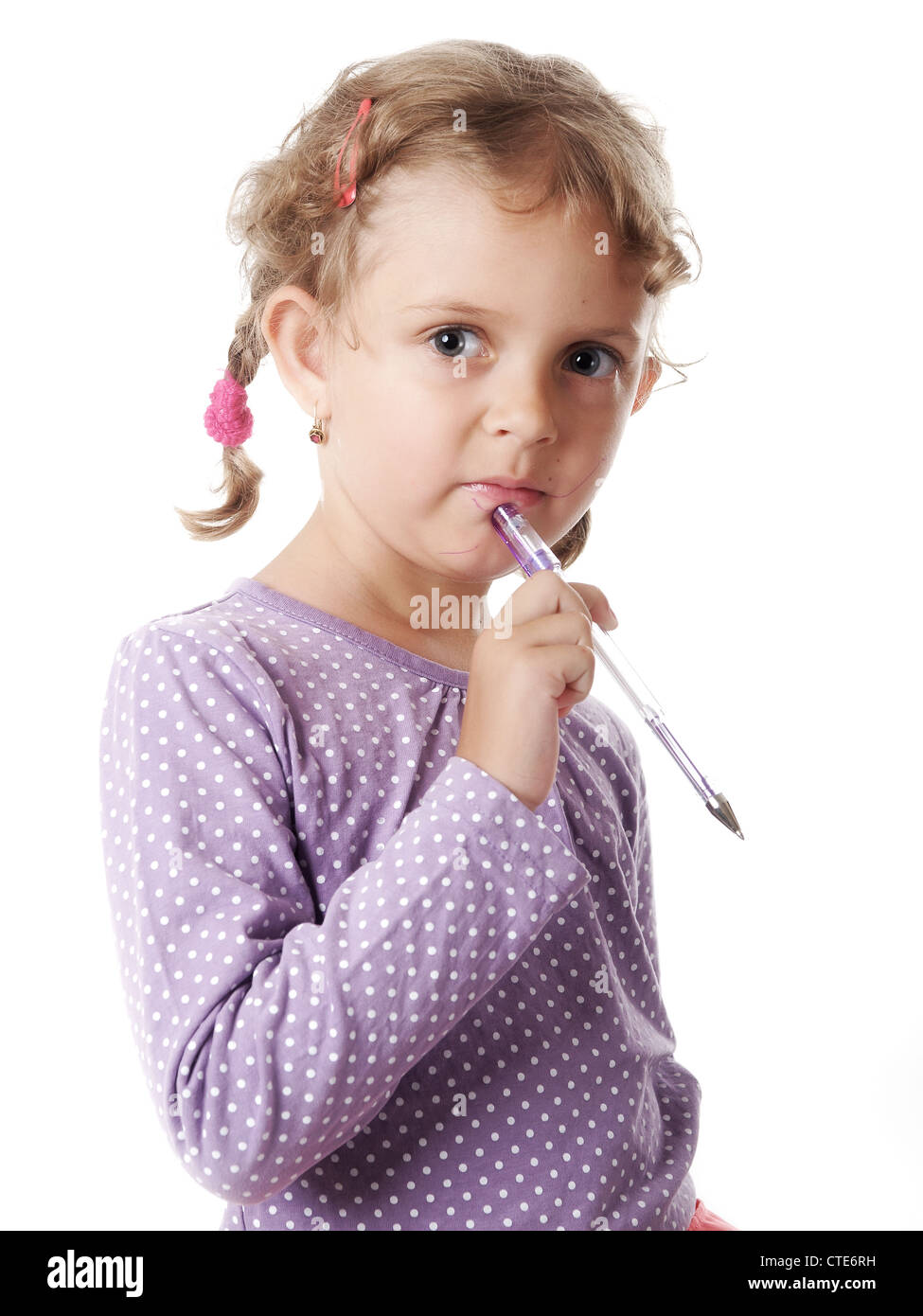 Little girl with pen Stock Photo - Alamy