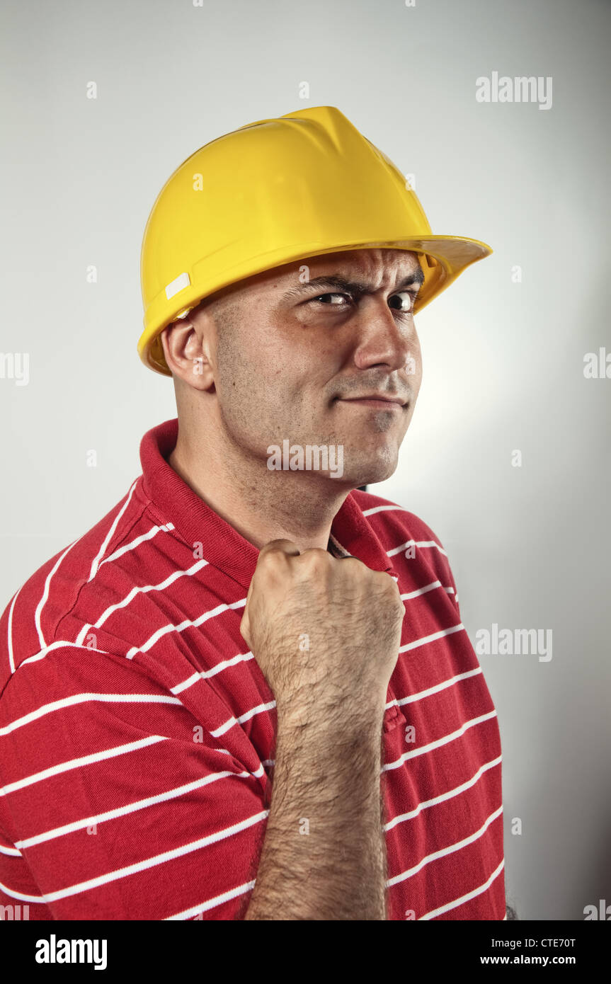 Construction worker raising fist hi-res stock photography and images ...