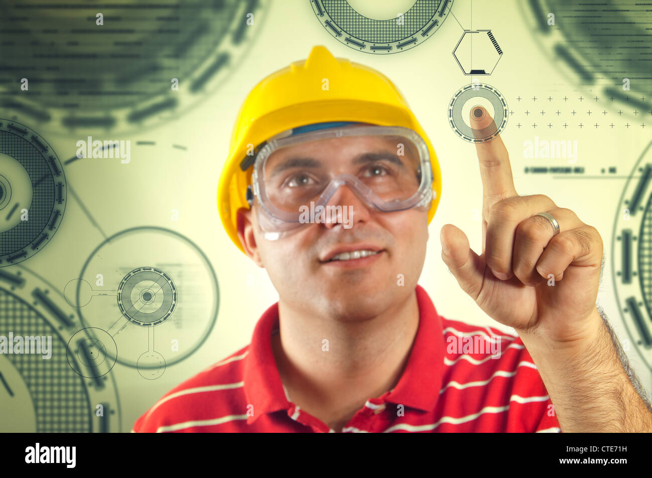 Construction worker pressing the button on touch screen display Stock ...
