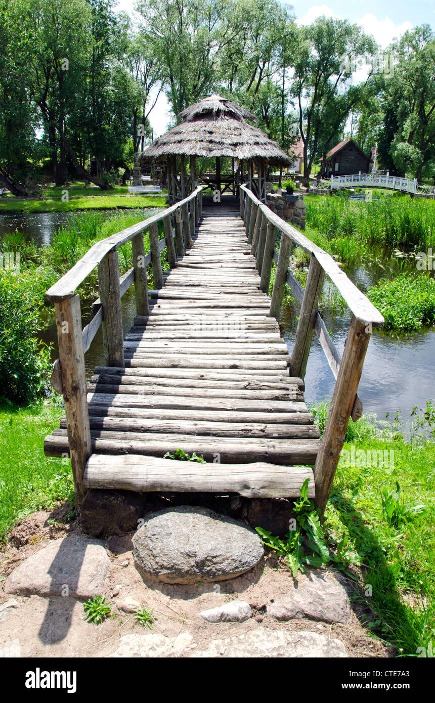 small wooden bridge in the resort park Stock Photo - Alamy