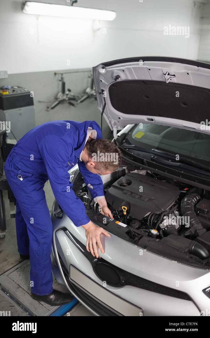 Mechanic focused on repairing hi-res stock photography and images - Alamy