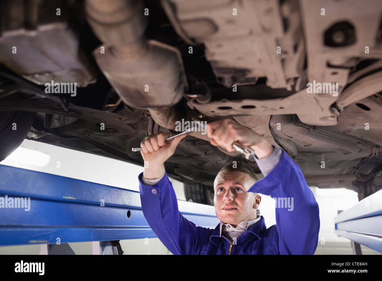 Mechanic using tools Stock Photo - Alamy