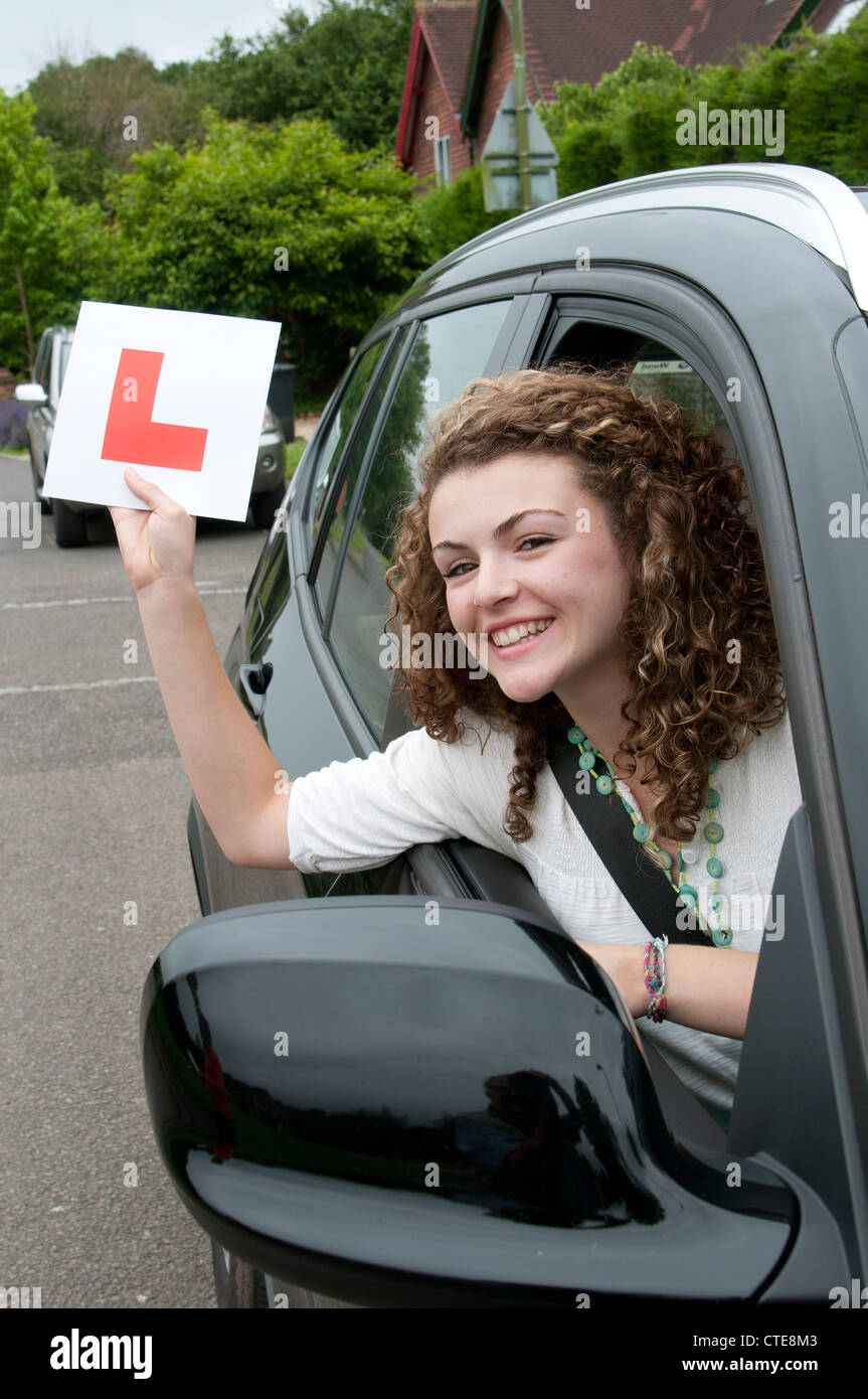 Waving smiling learner driver hi-res stock photography and images - Alamy