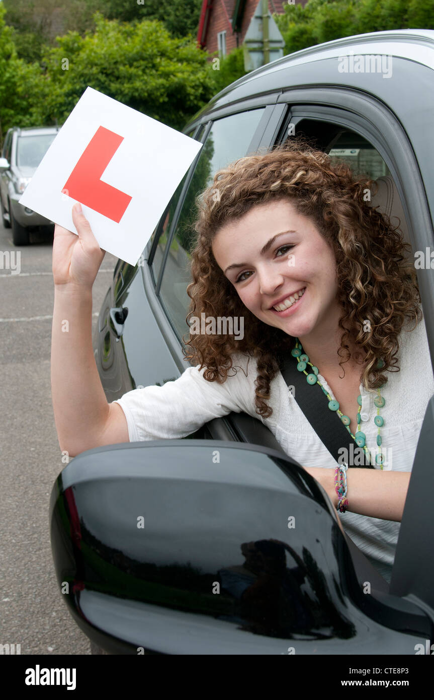 Waving smiling learner driver hi-res stock photography and images - Alamy