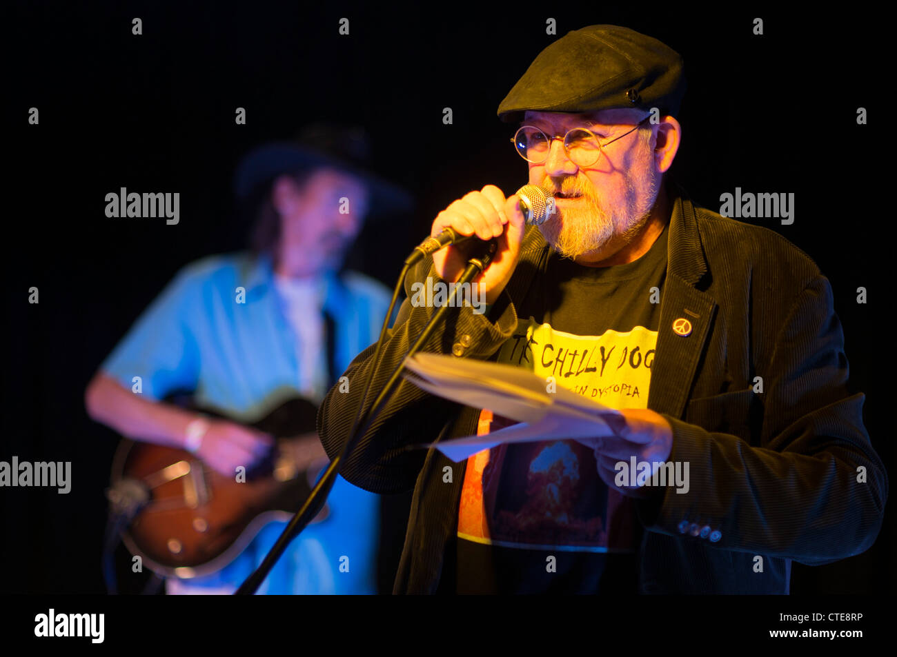 Stand up performance poets The Chilly Dogs reading poems at Floodstock ...