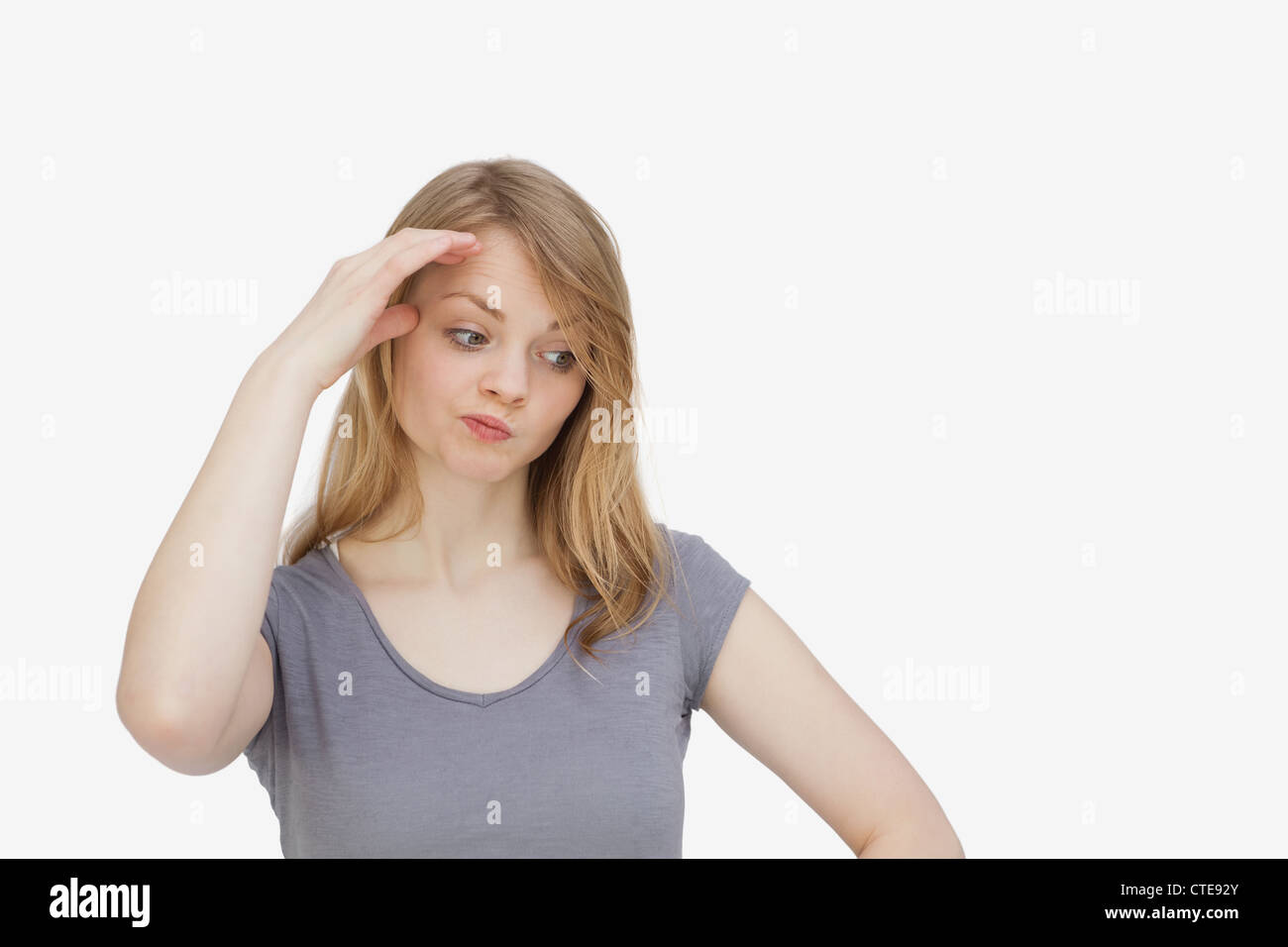 Woman being lost in thought Stock Photo - Alamy