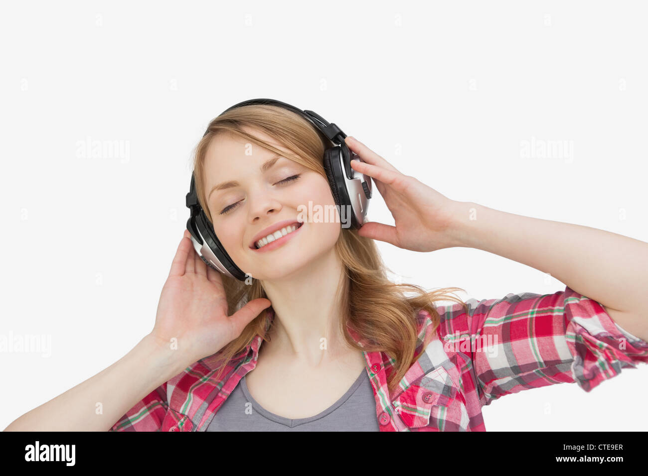 Woman listening music closing hi-res stock photography and images - Alamy