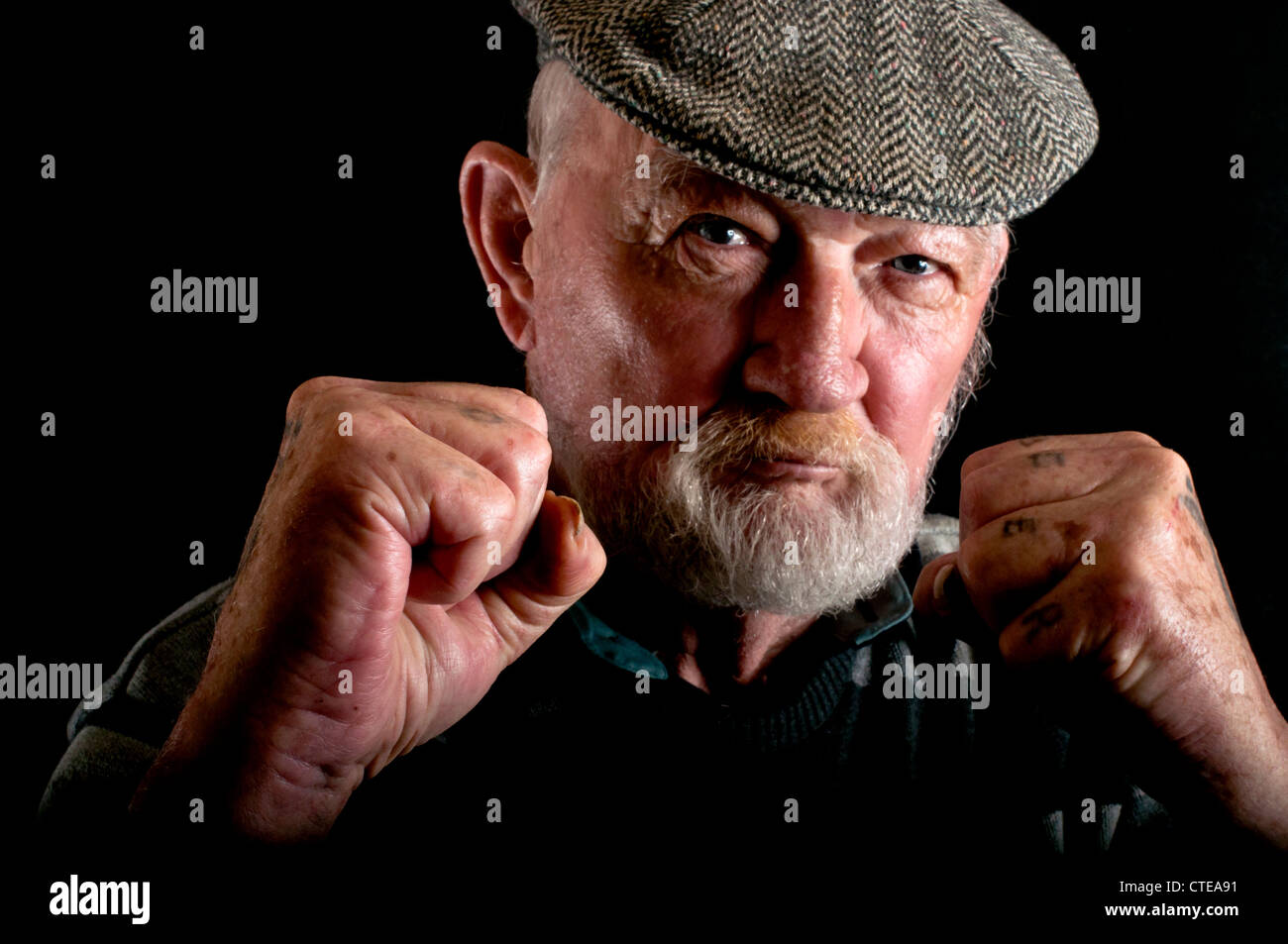 Angry old senior man boxing Stock Photo - Alamy