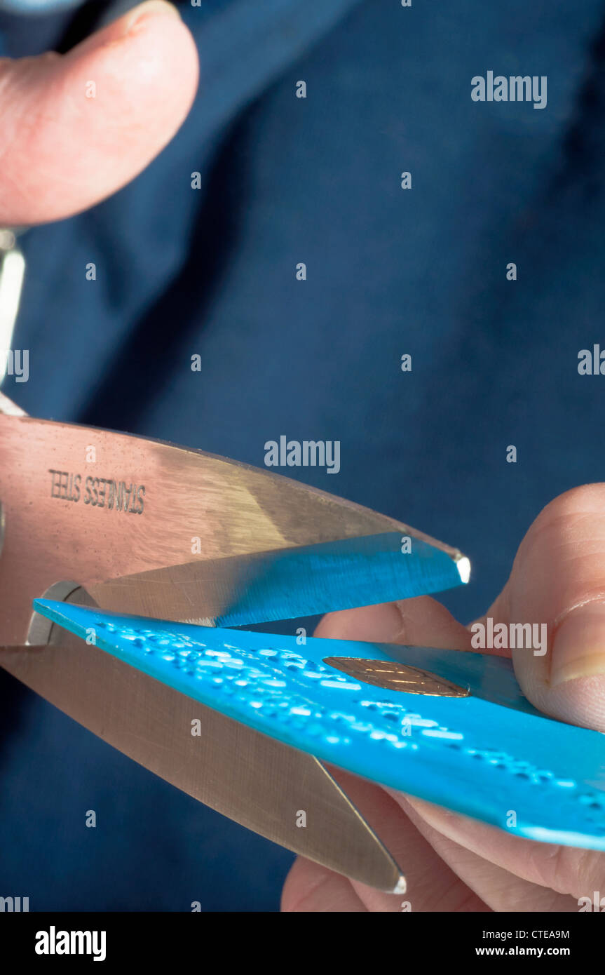 cutting up credit debit card Stock Photo - Alamy