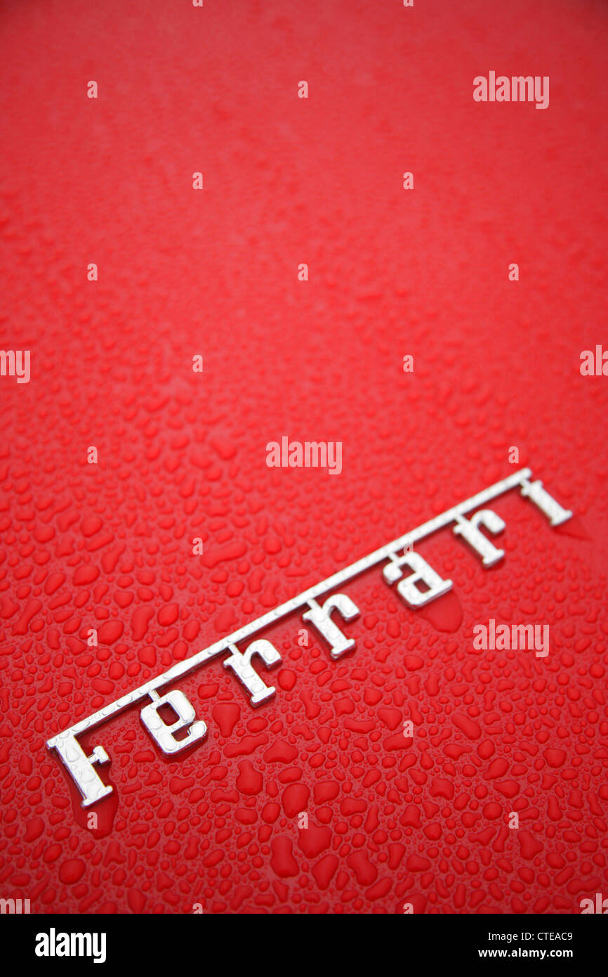 Badge on red Ferrari sportscar Stock Photo - Alamy