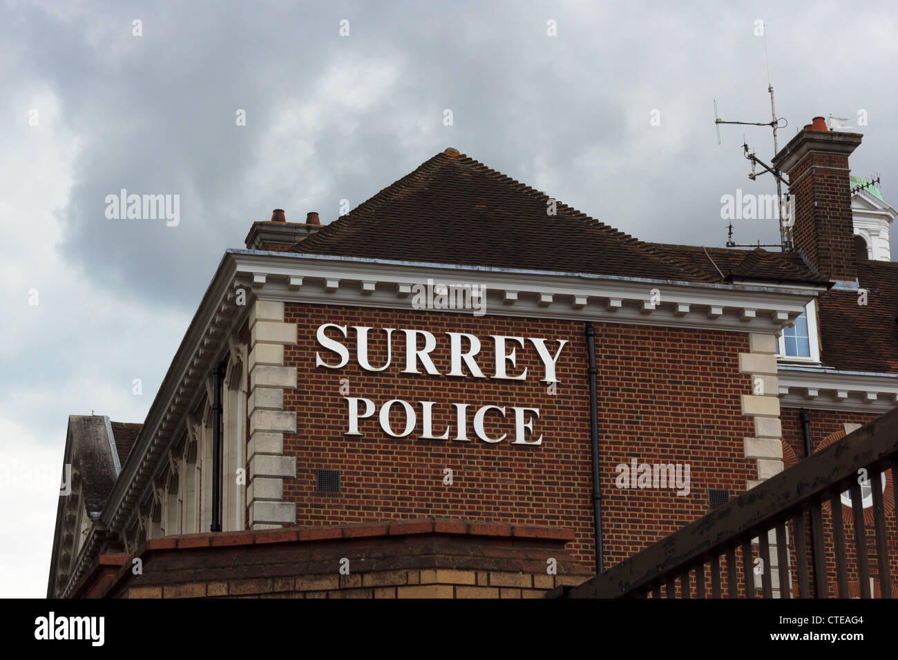 Large Surrey Police sign on the side of Woking Police station Stock ...