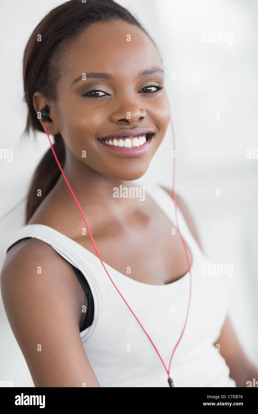 Close up of a black woman listening music Stock Photo - Alamy