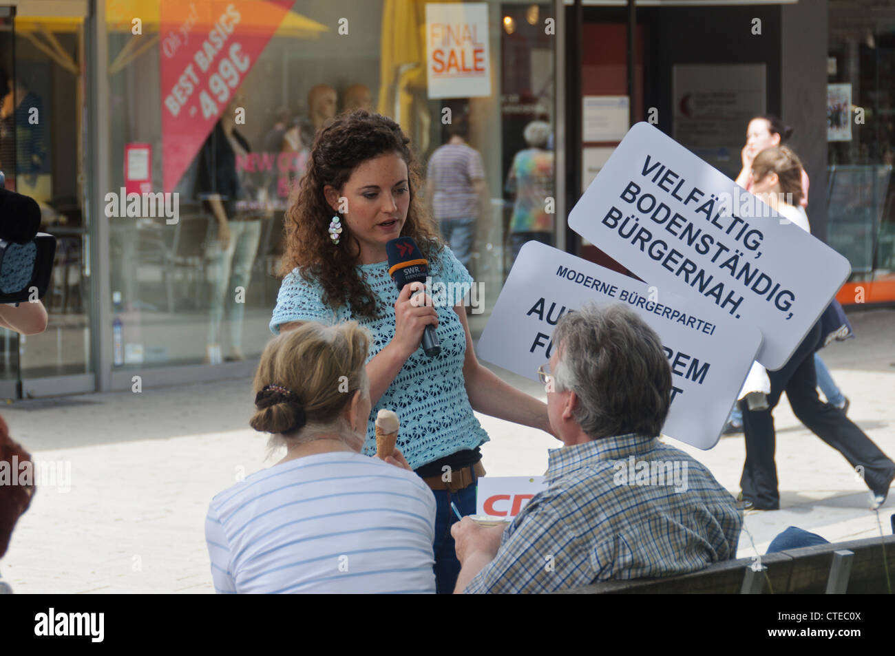 SWR Suedwestrundfunk German Television Crew Female Reporter interviews ...