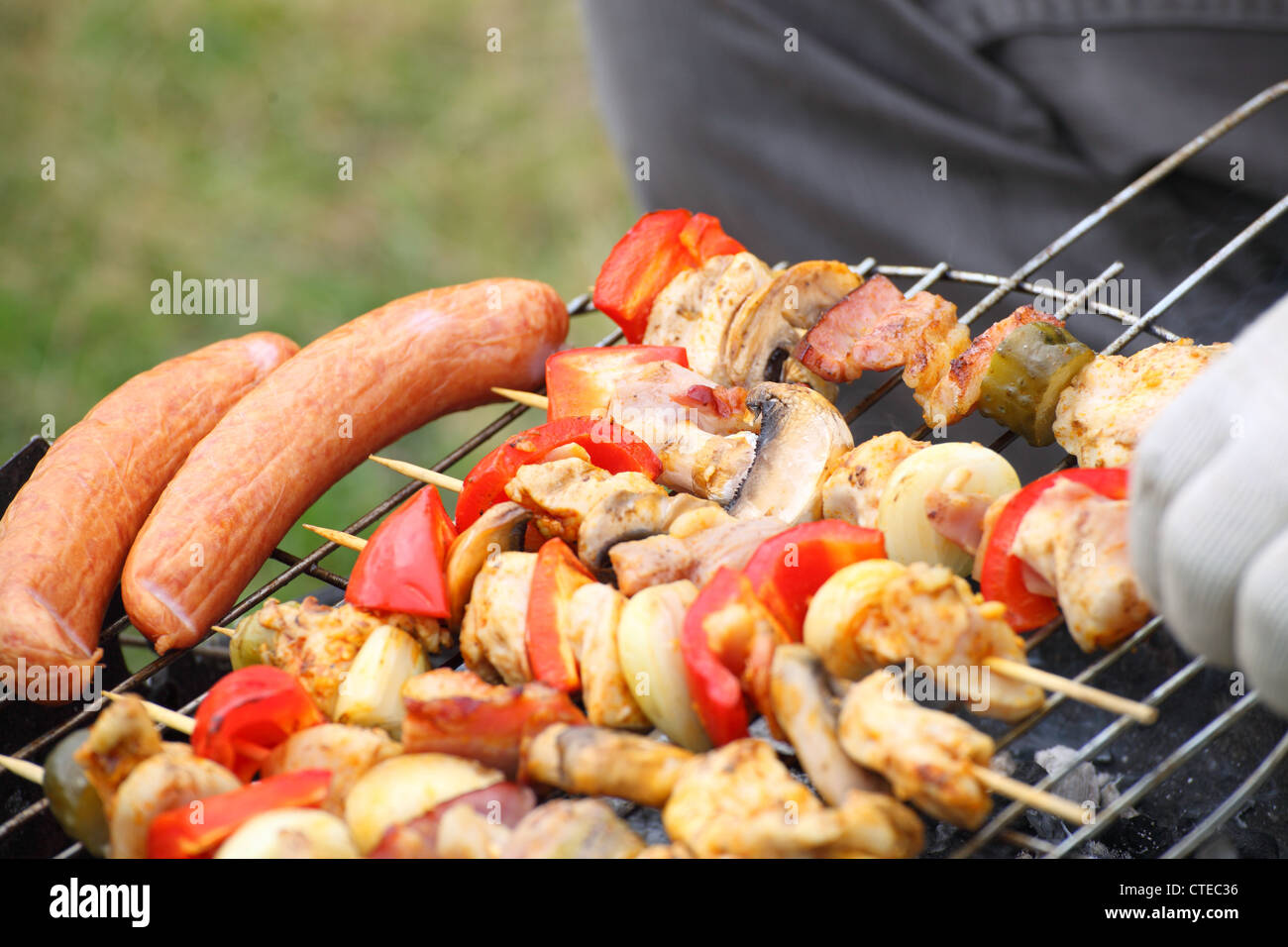 Barbecue with delicious grilled meat on grill BBQ Stock Photo - Alamy