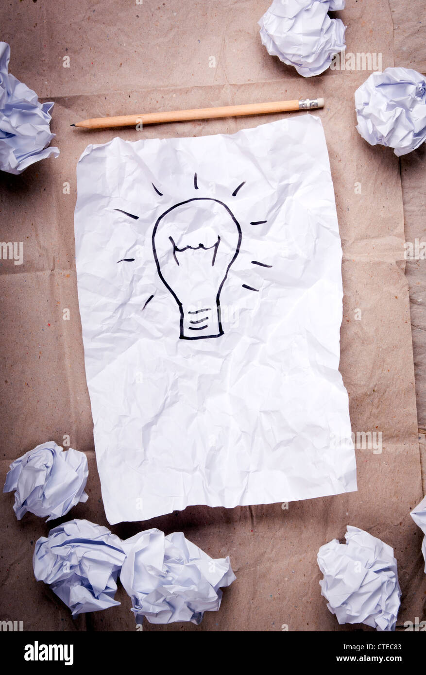 Crumpled paper with a lightbulb idea concept and crumpled paper ...