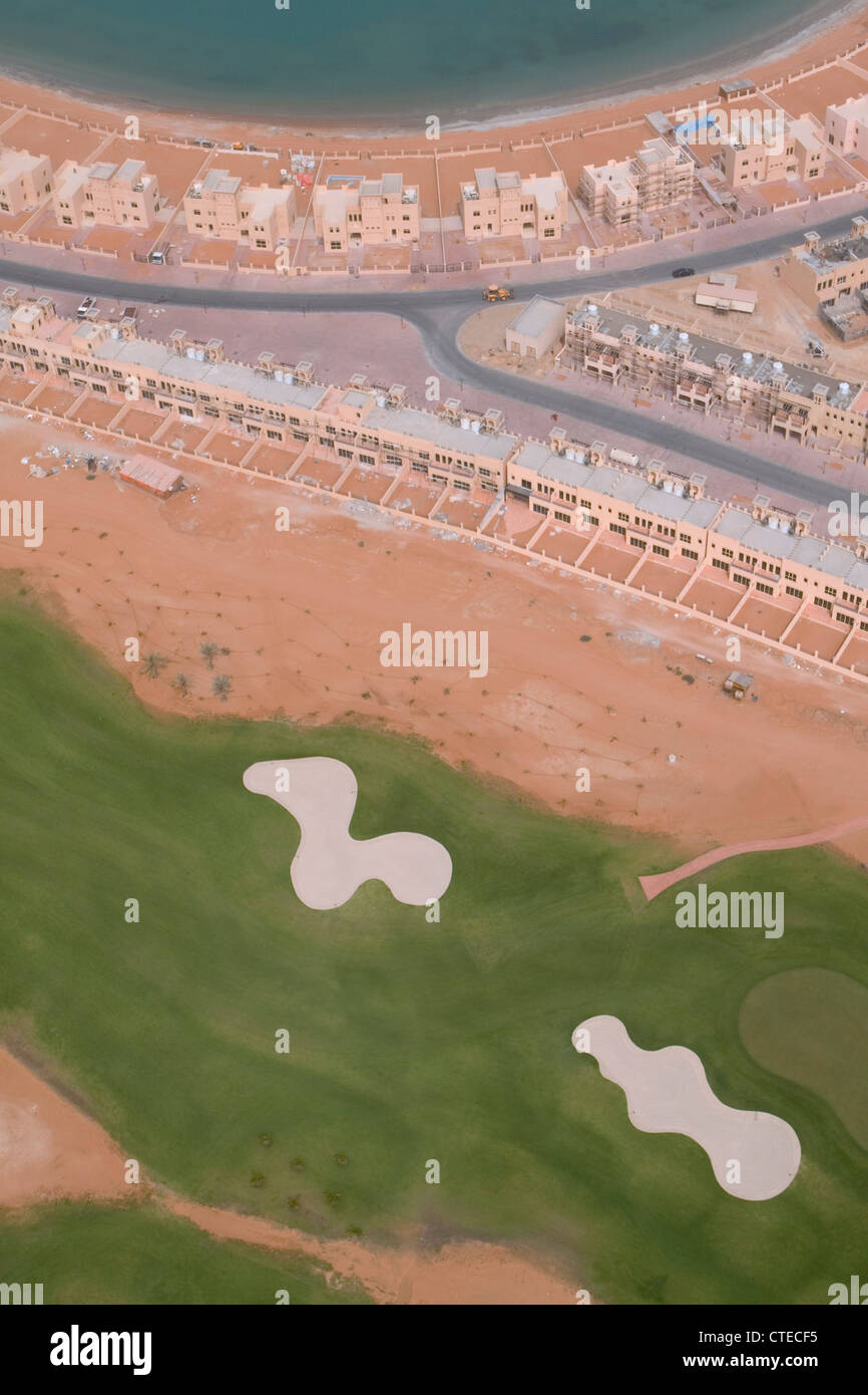 Aerial view of residential villas and golf fairways, Ras al-Khaimah ...