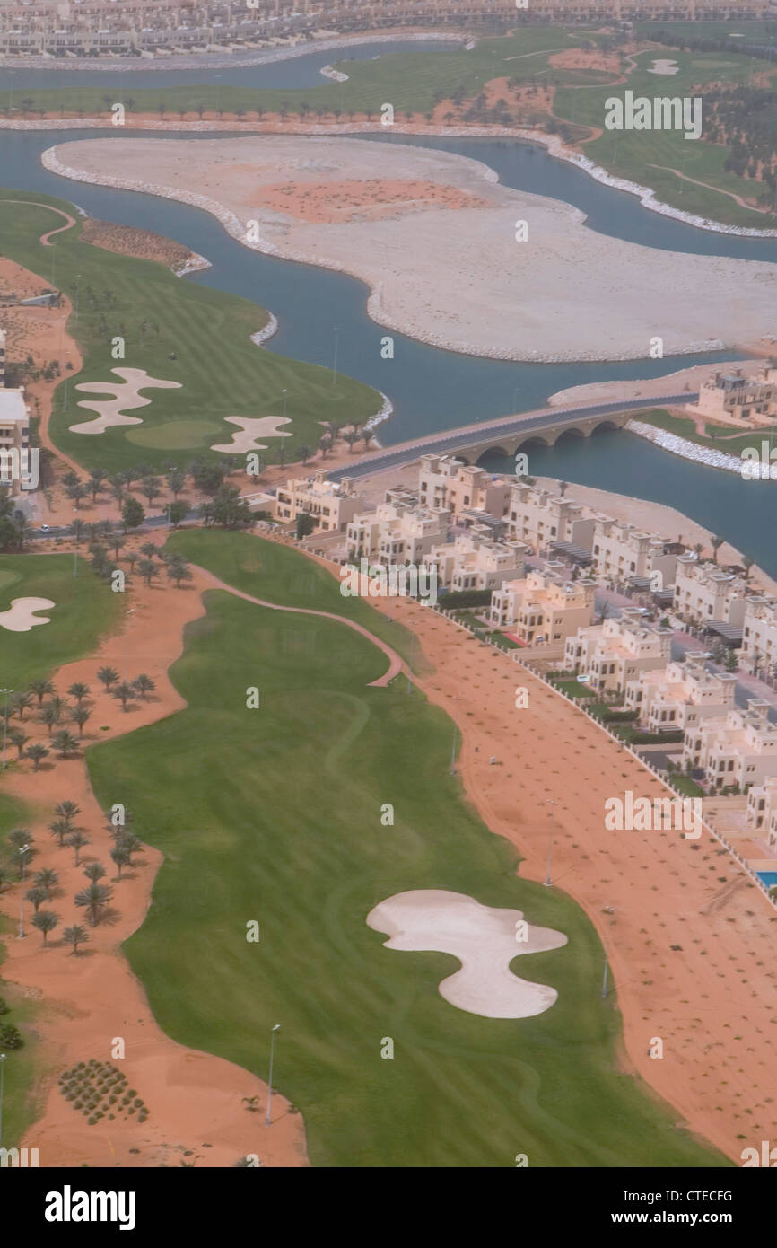 Aerial view of residential villas and golf fairways, Ras al-Khaimah ...