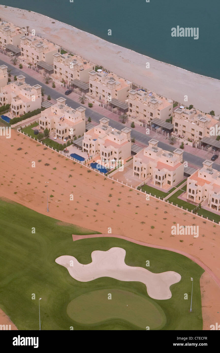 Aerial view of residential villas and golf fairways, Ras al-Khaimah ...