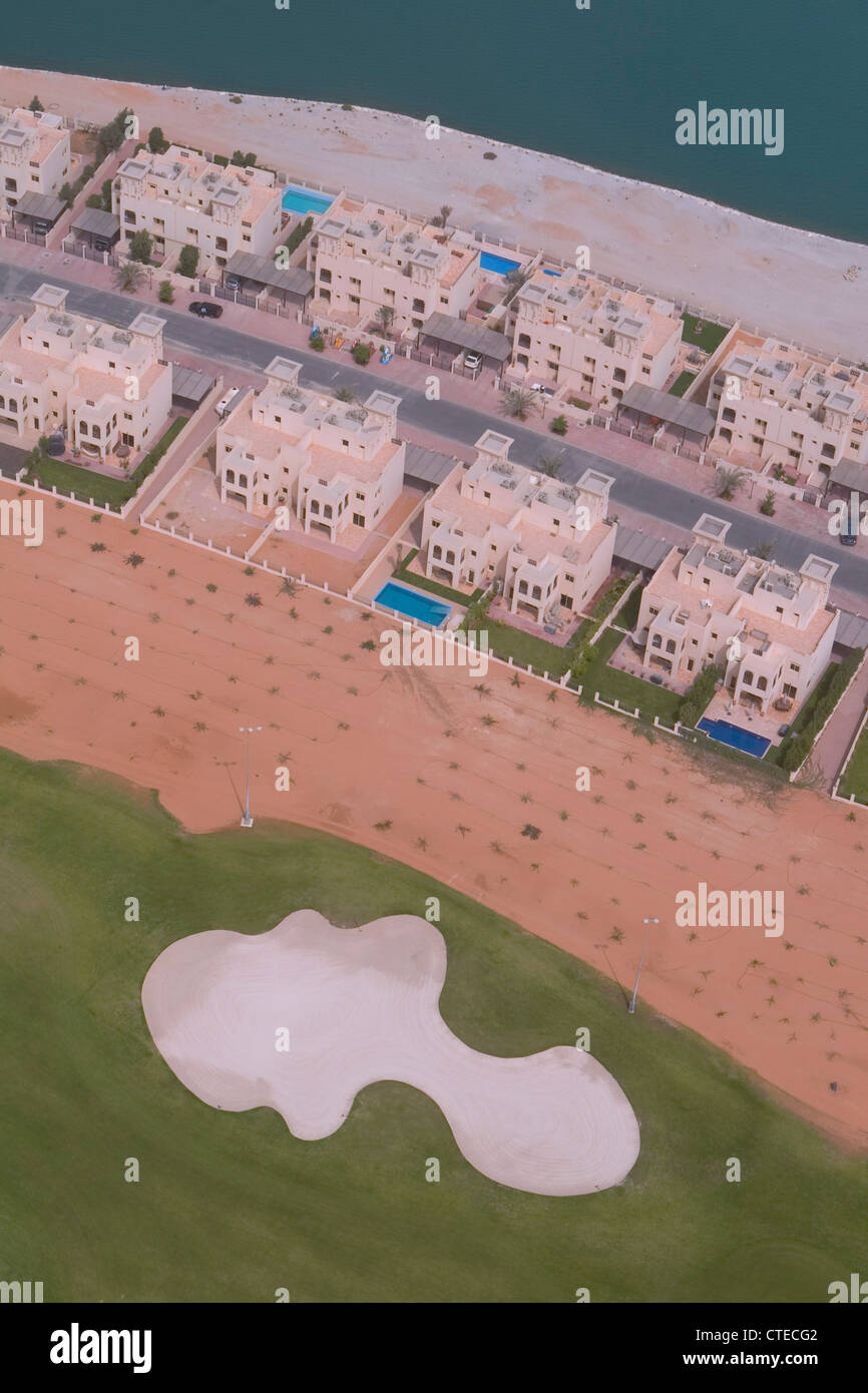 Aerial view of residential villas and golf fairways, Ras al-Khaimah ...