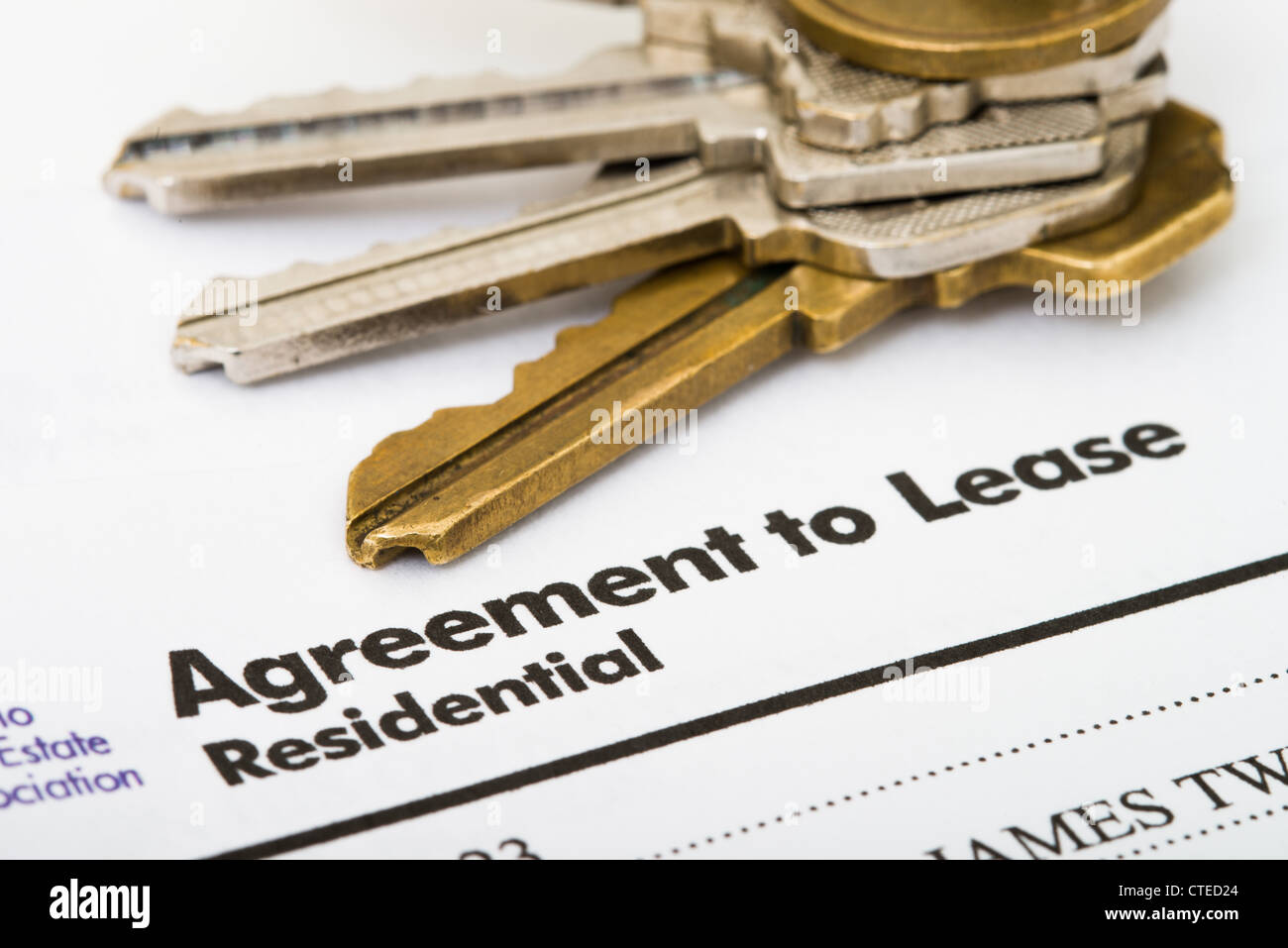 Keys and a lease agreement Stock Photo - Alamy