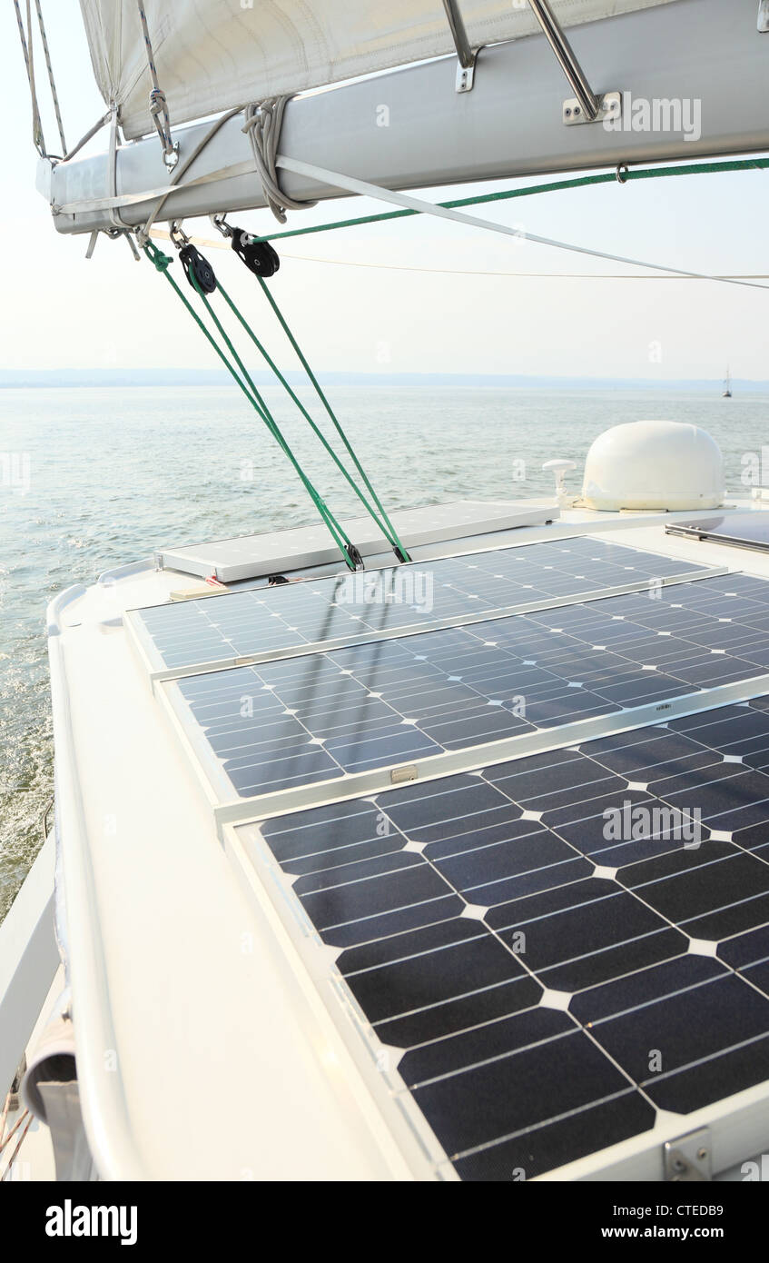 Solar charging batteries aboard a sail boat Photovoltaic panels energy ...