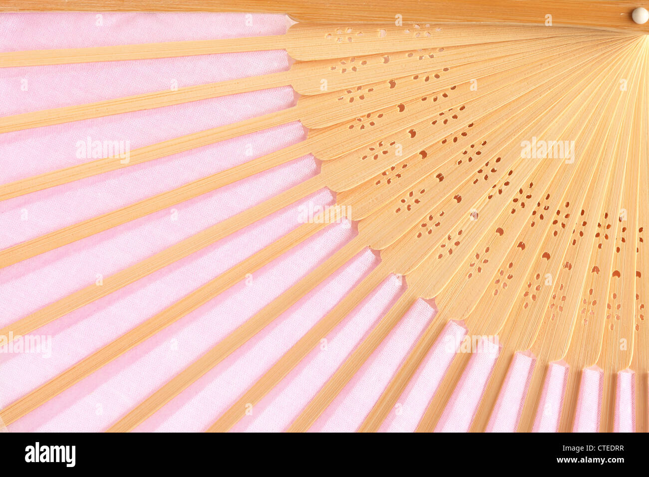 Pink opened fan as a background texture Stock Photo - Alamy