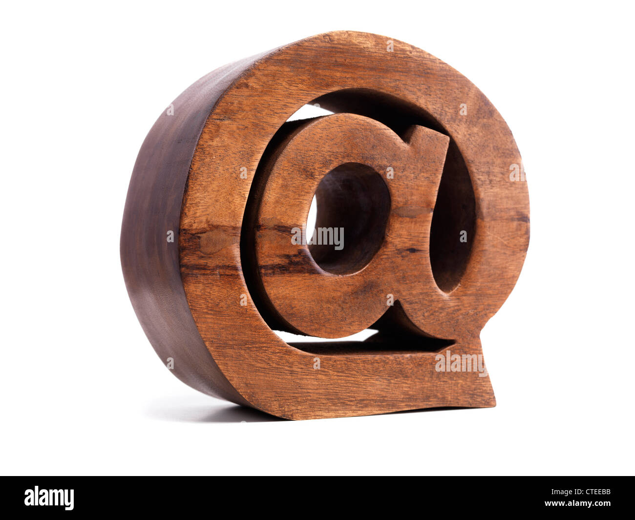 Email address symbol AT @ made of wood isolated on white background ...