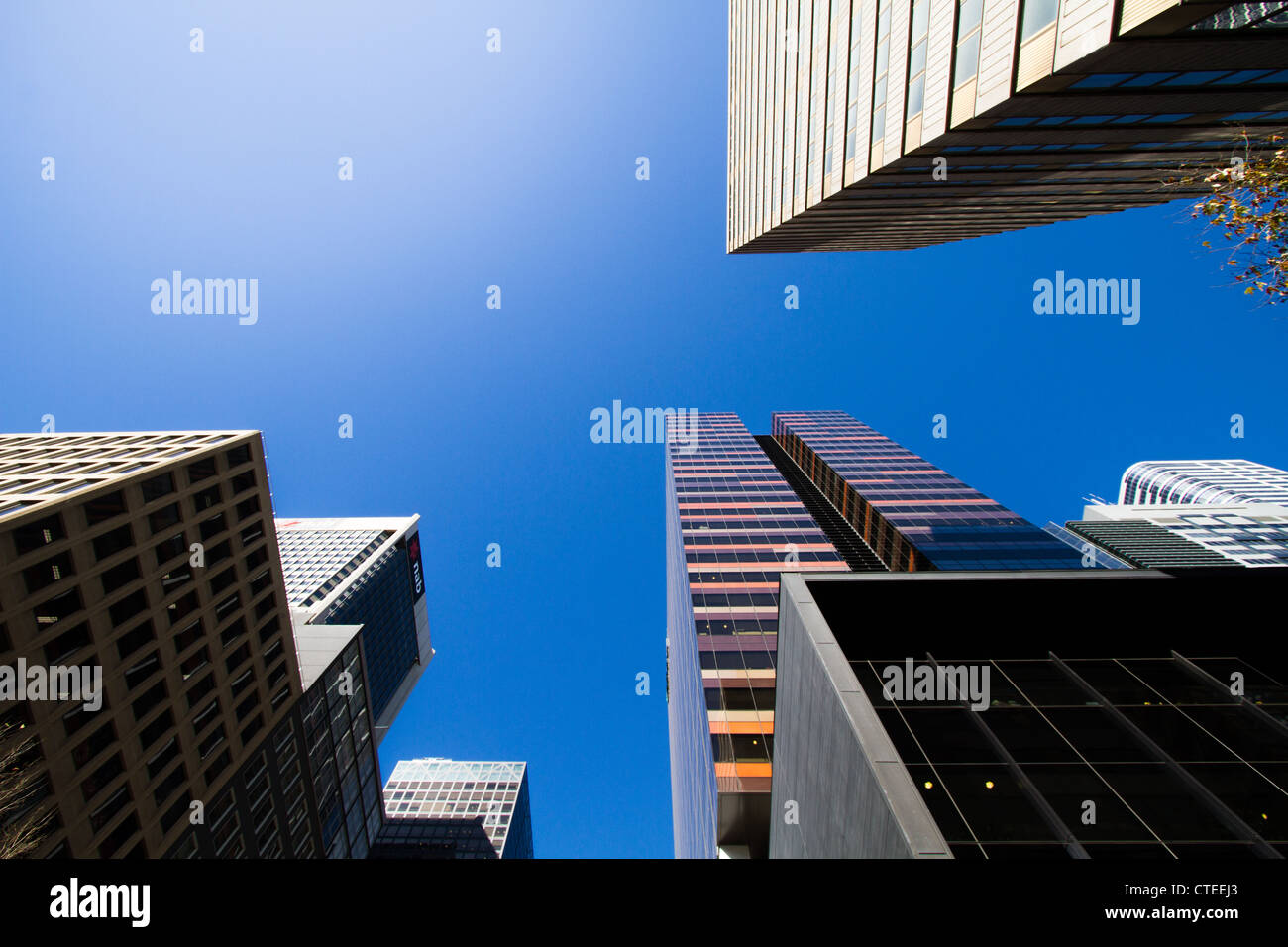 Looking up at city buildings and the sky Stock Photo - Alamy
