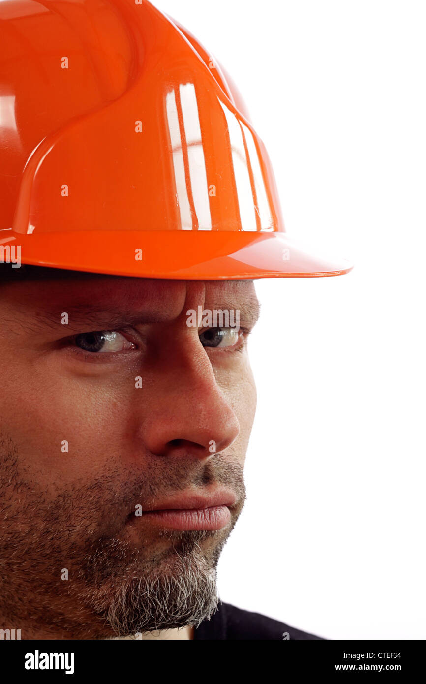 Sceptically construction worker isolated on white Stock Photo - Alamy