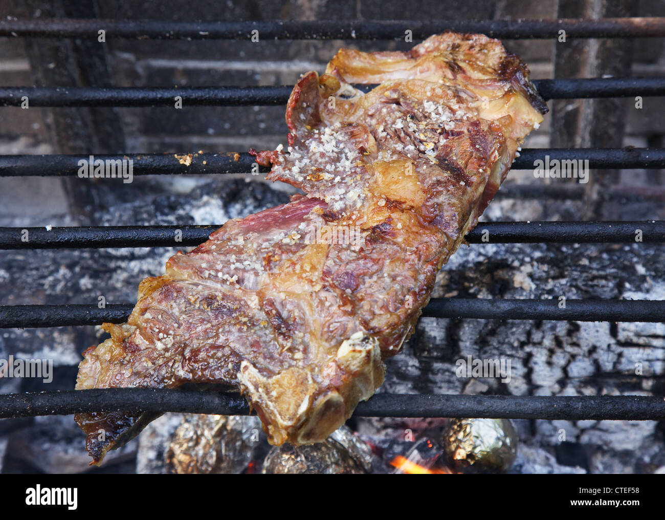 Cow big chop at grill Stock Photo - Alamy