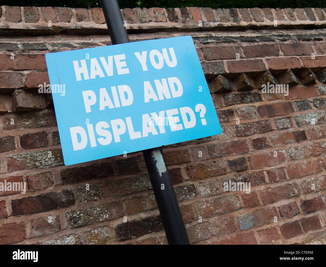 Have you paid and displayed sign in car park Stock Photo - Alamy