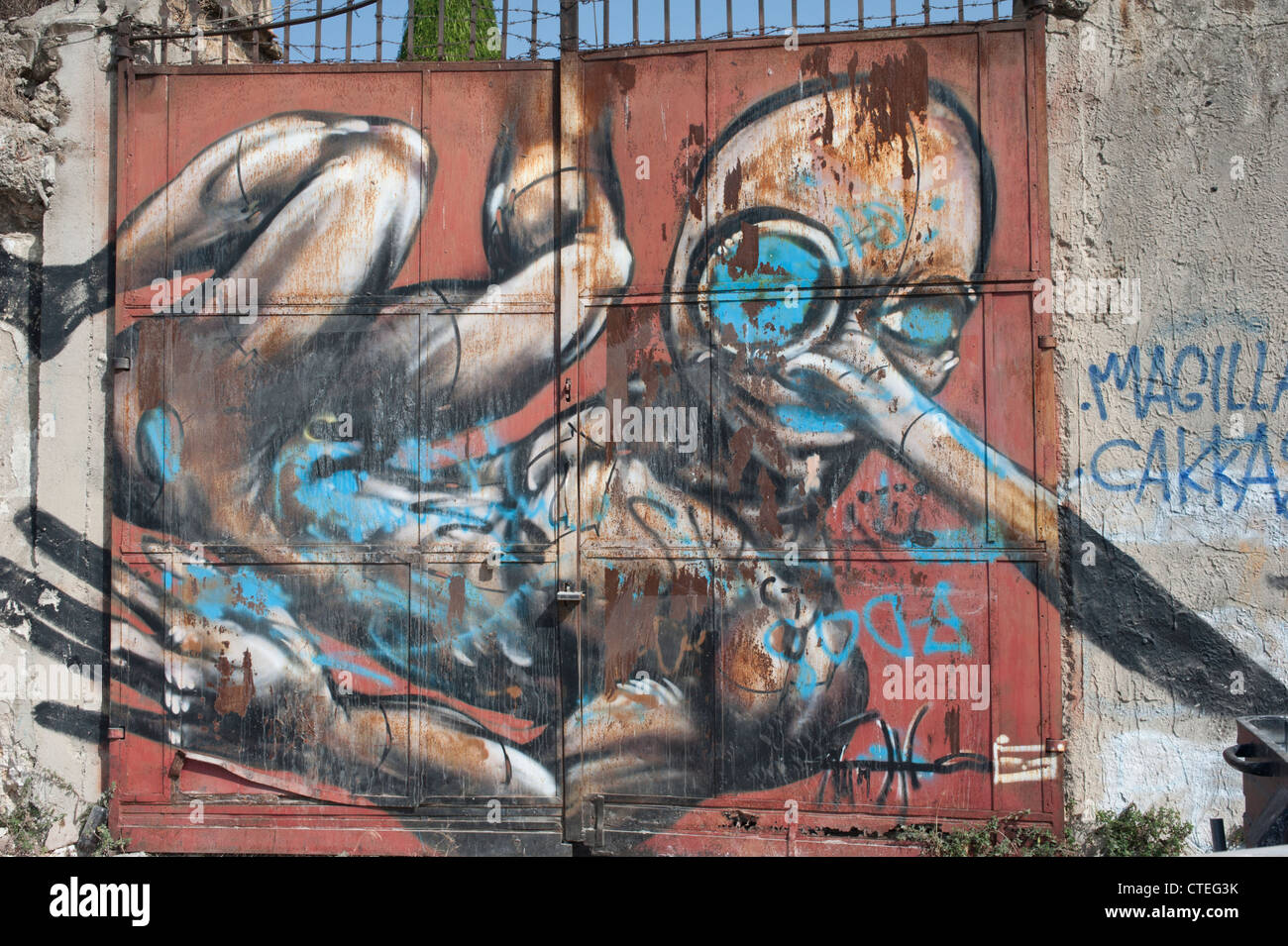 Graffiti on the walls in the historic centre of Palermo, Sicily, Italy ...