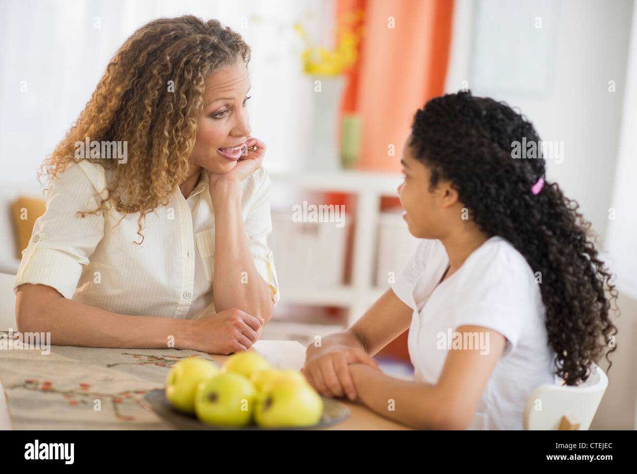 USA, New Jersey, Jersey City, Mother talking with daughters (10-11 ...
