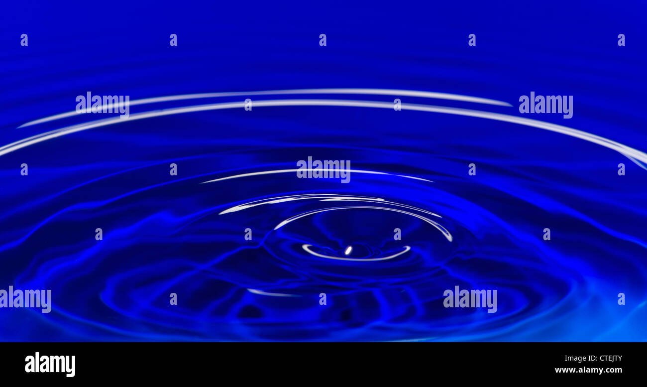 Blue water splash Stock Photo - Alamy