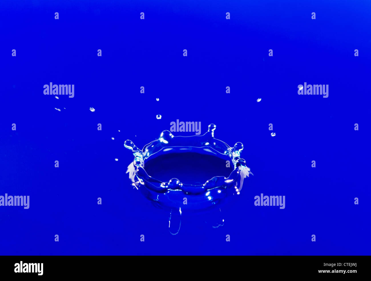 Blue water splash Stock Photo - Alamy
