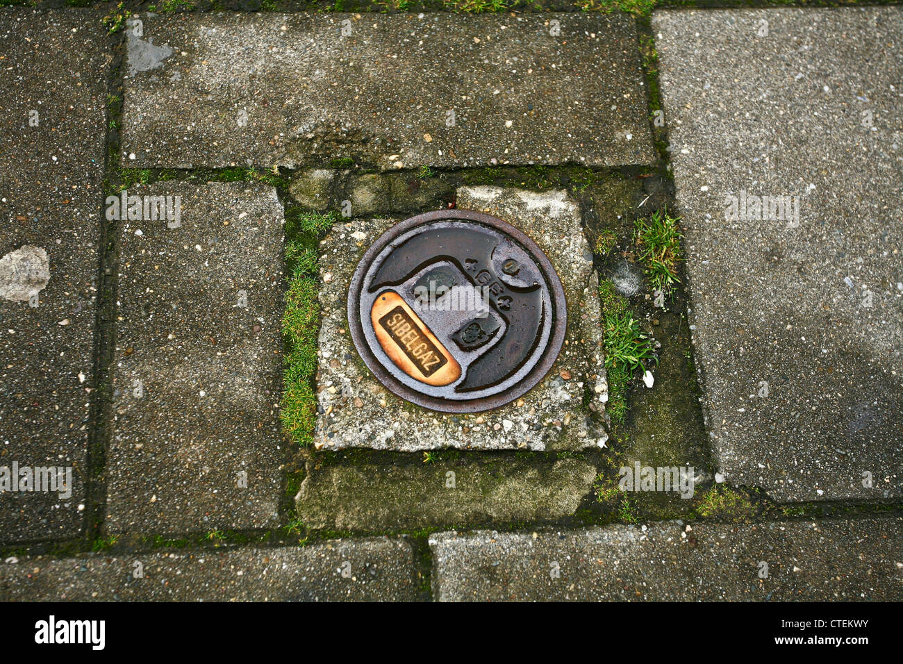 gas plate in a street in Brussels Stock Photo - Alamy