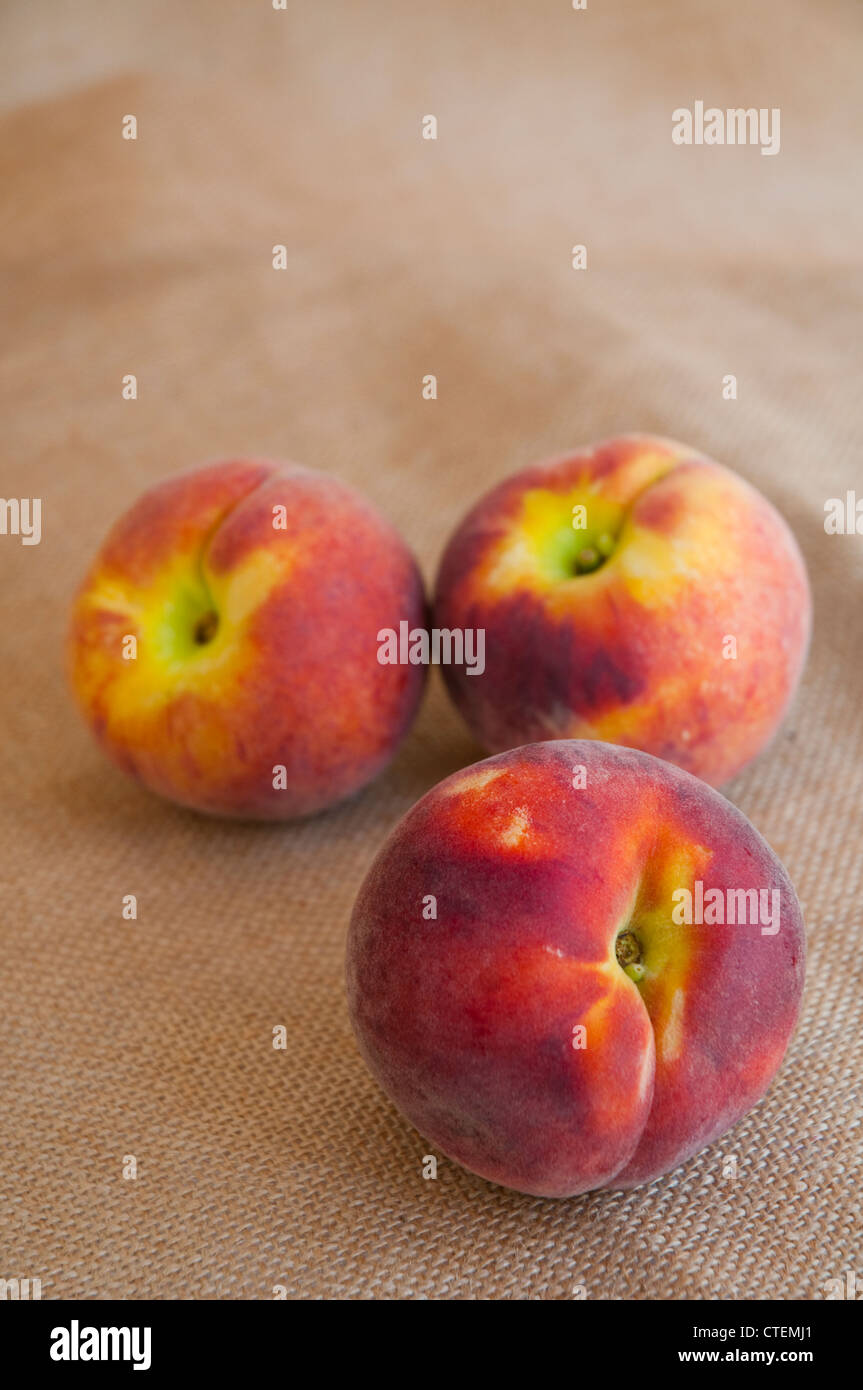 Three peaches. Still life Stock Photo - Alamy