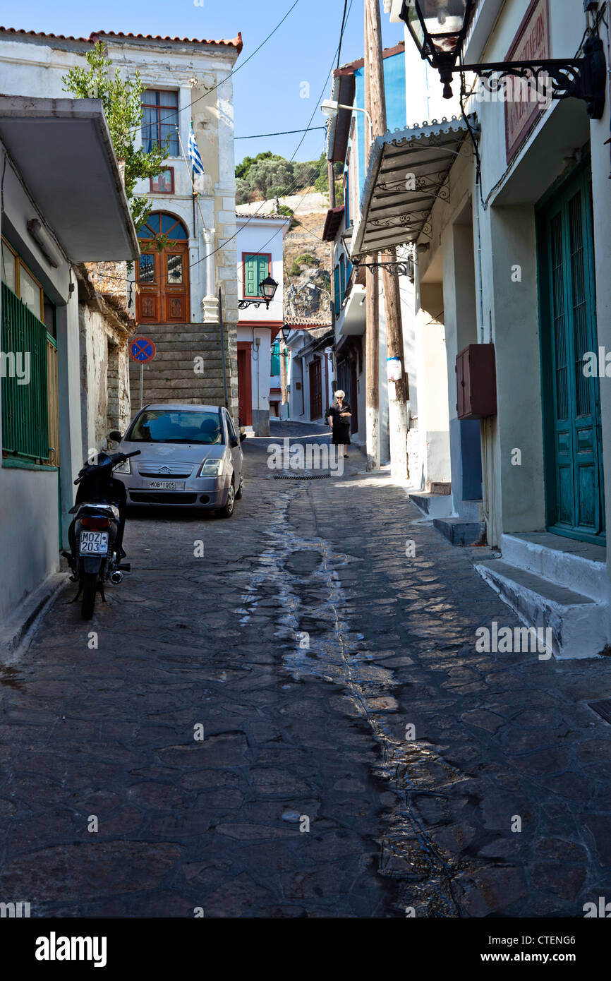Brightly painted houses and narrow cobbled streets in the village of ...