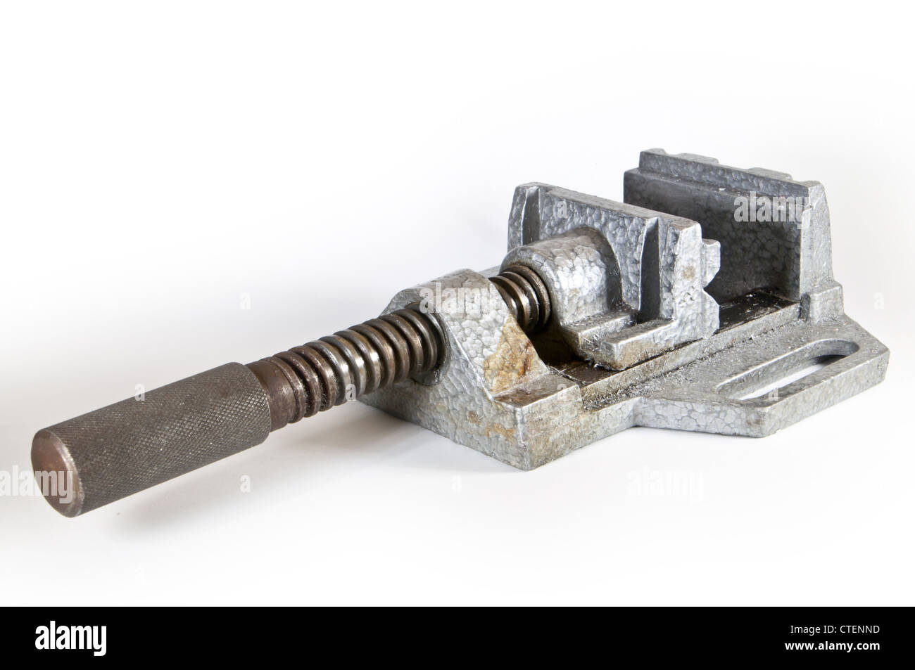 A metal vice isolated on white background Stock Photo - Alamy
