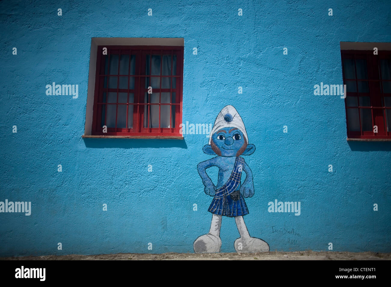 A painting of a smurf dressed with the Scotland's national dress ...